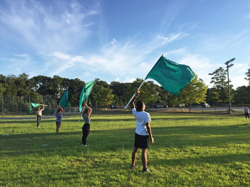 Color guard, band march on with in-person practices – Dartmouth School ...